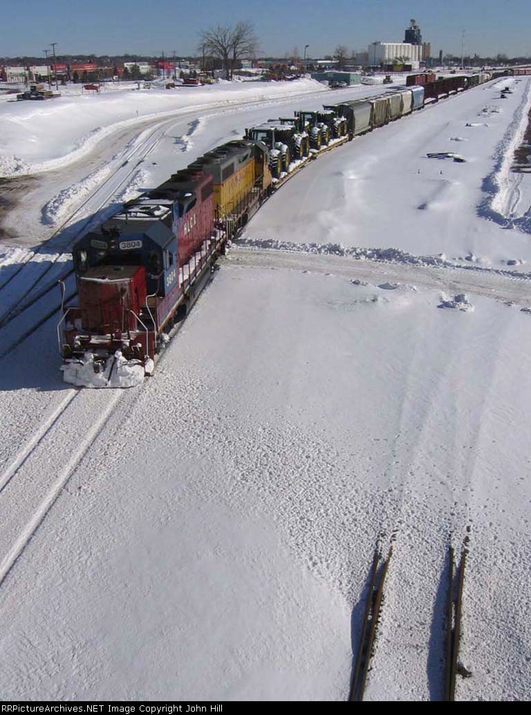 070303012 inbound UP/BN transfer on North Receiver in BNSF Northtown Transfer Yard after winter ...